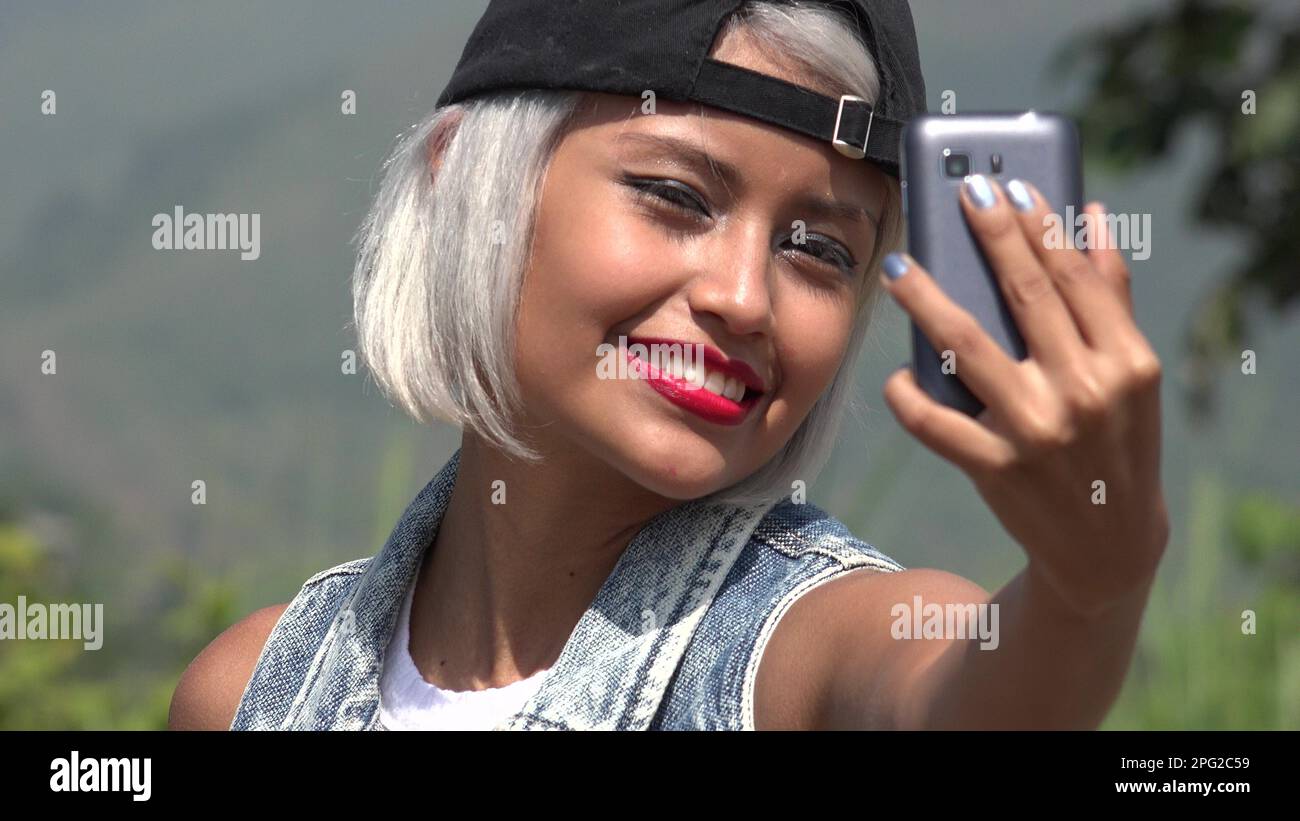Beautiful young woman taking selfy hi-res stock photography and images ...