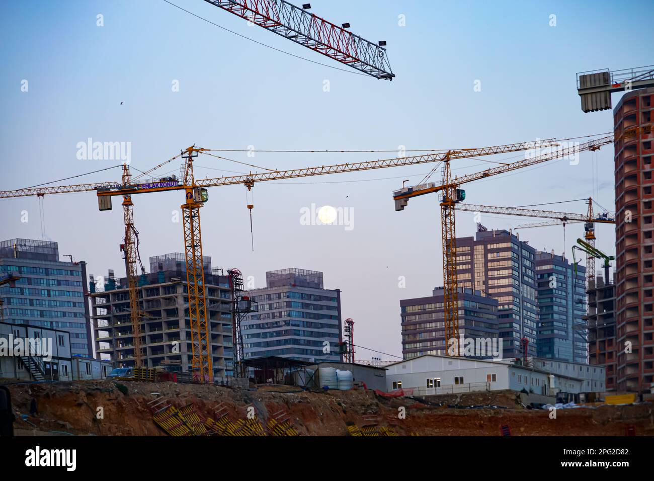 Crane with moon hi-res stock photography and images - Alamy