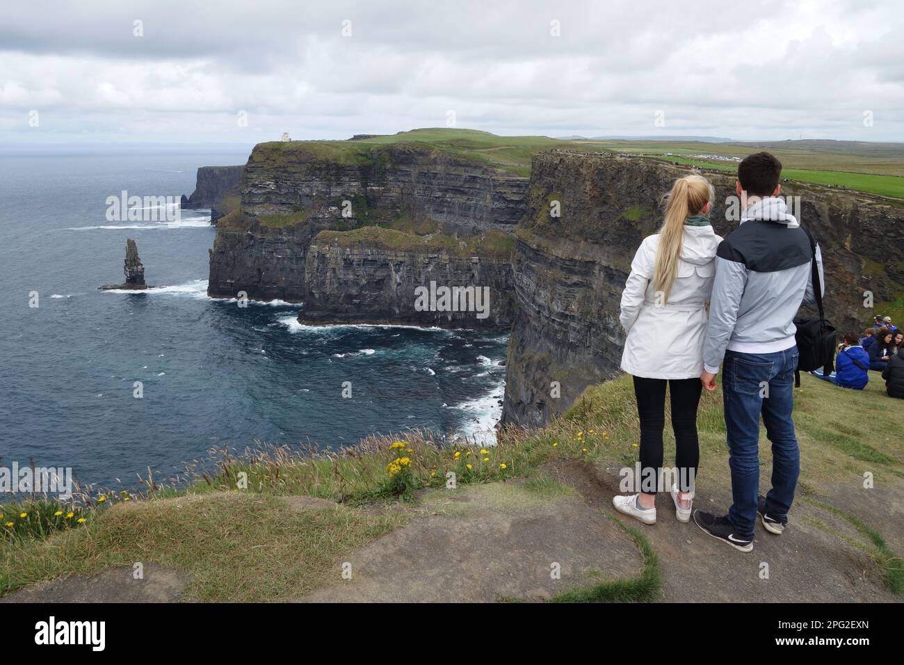 young couple viewing Cliffs of Moher, Ireland Stock Photo - Alamy