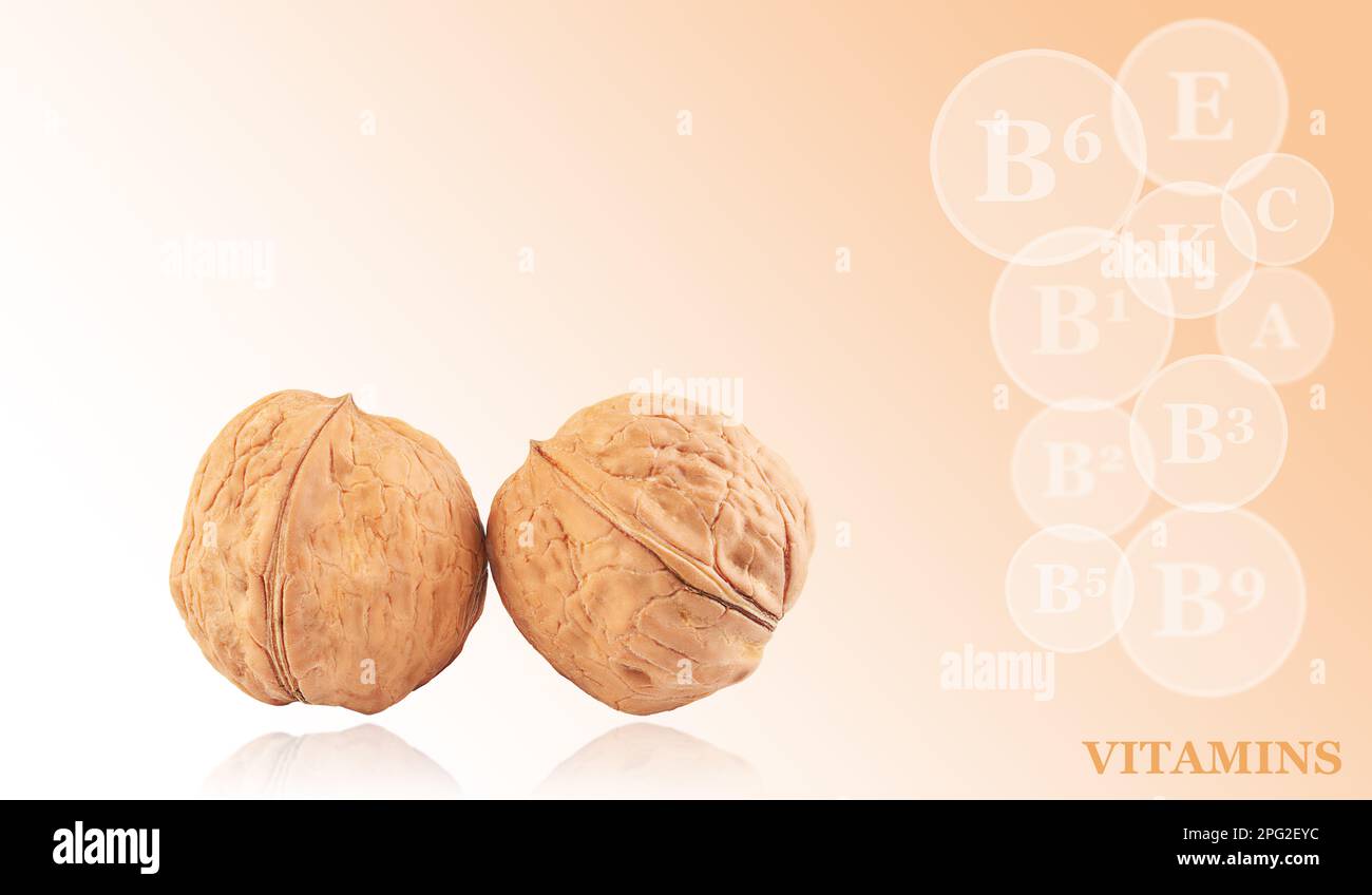 fresh kernels, broken and whole walnuts close-up isolated on color ...