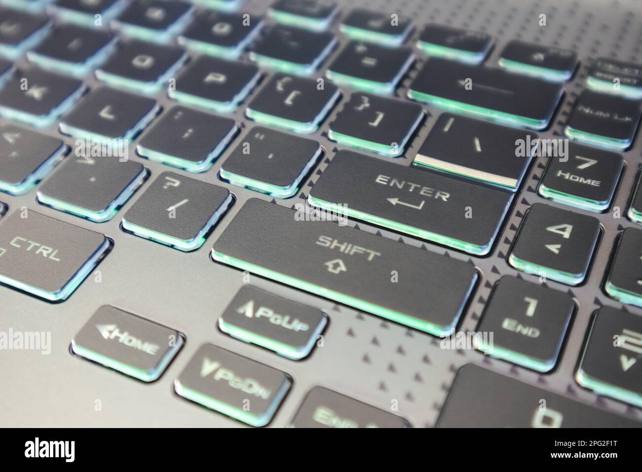 Laptop keys with illumination and blurred background. Gaming powerful ...
