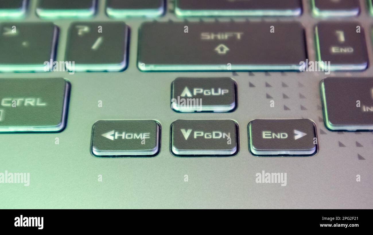 Laptop arrow keys. Gaming powerful grey notebook keyboard close-up ...