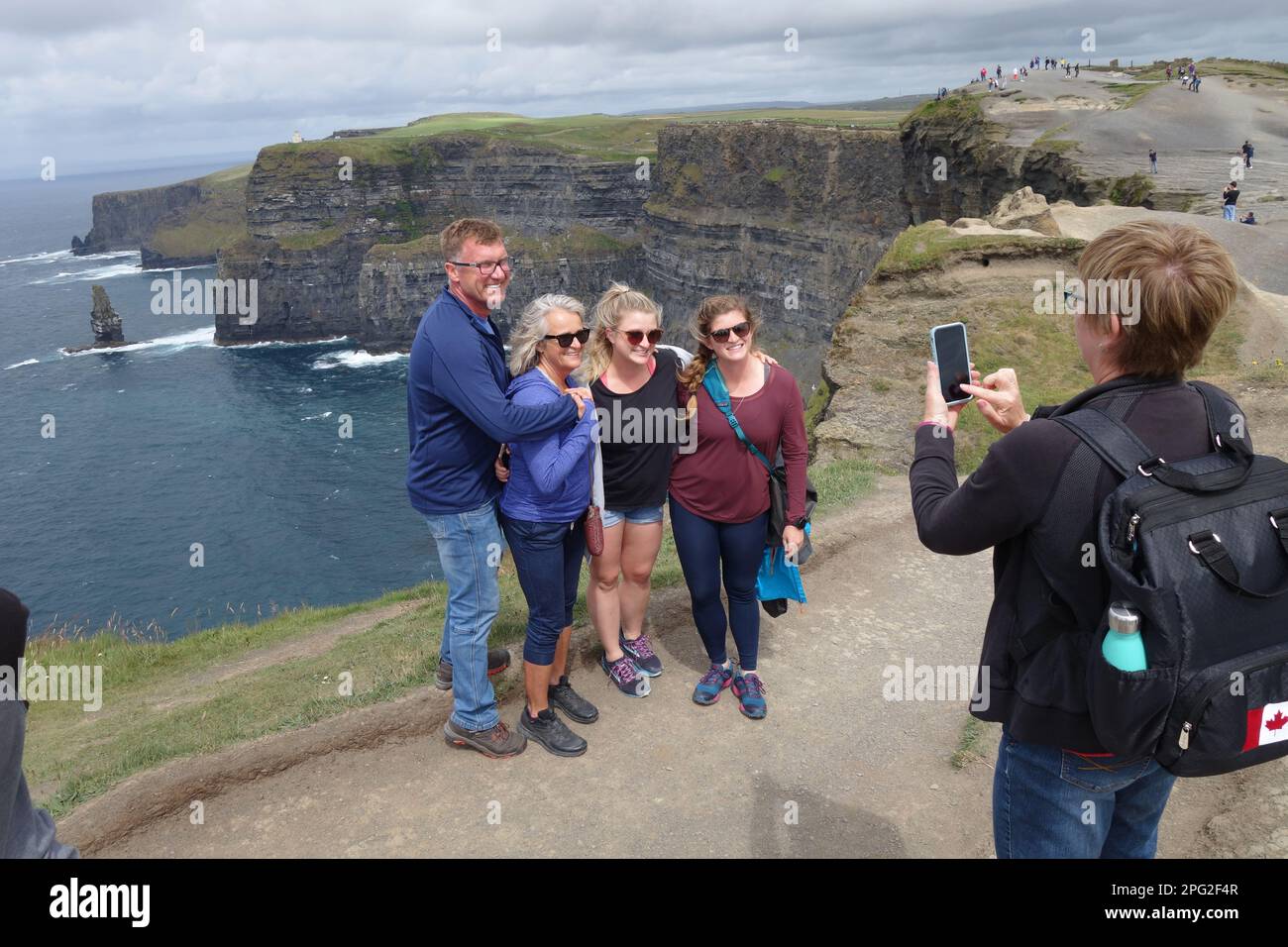 tourists visiting Cliffs of Moher, Ireland Stock Photo - Alamy