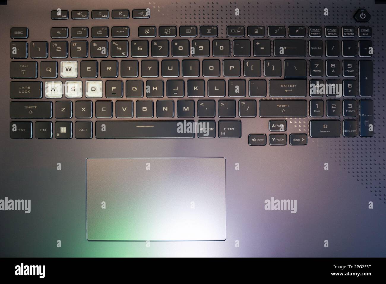 Laptop full-sized keyboard with colorful illumination. Gaming powerful ...