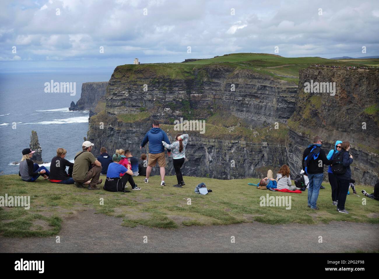 tourists visiting Cliffs of Moher, Ireland Stock Photo - Alamy