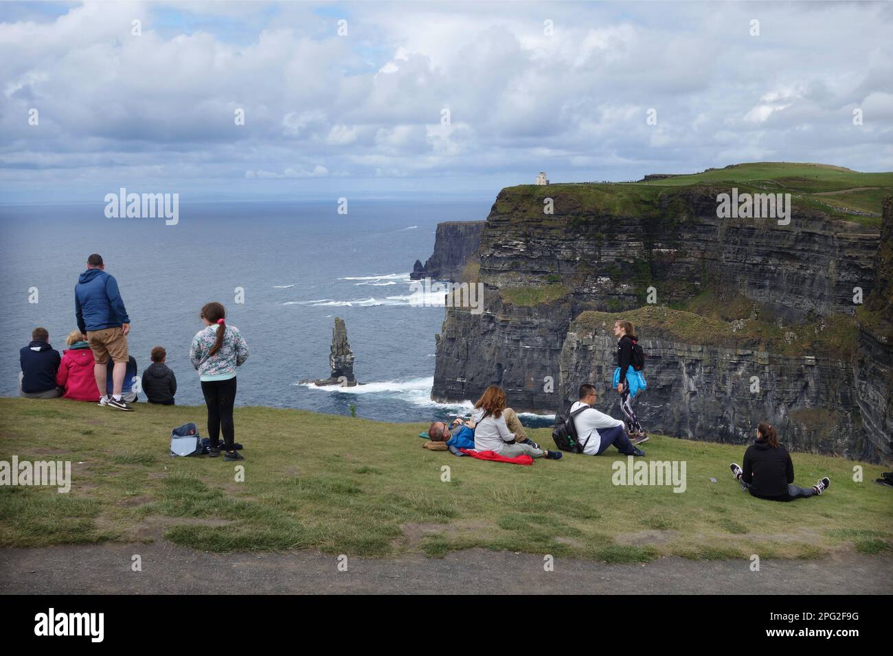 tourists visiting Cliffs of Moher, Ireland Stock Photo - Alamy