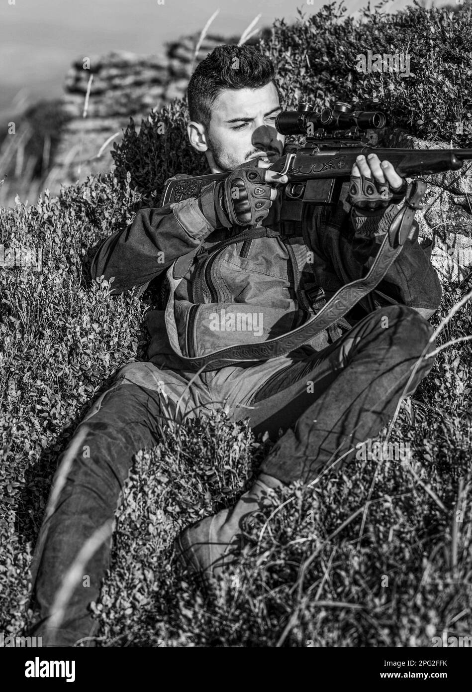 Hunt hunting rifle. Hunter man. Hunting period. The man is on the hunt ...