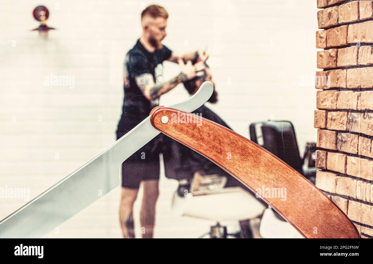 Straight razor, barbershop. Barber shop salon. Men haircut. Man in ...