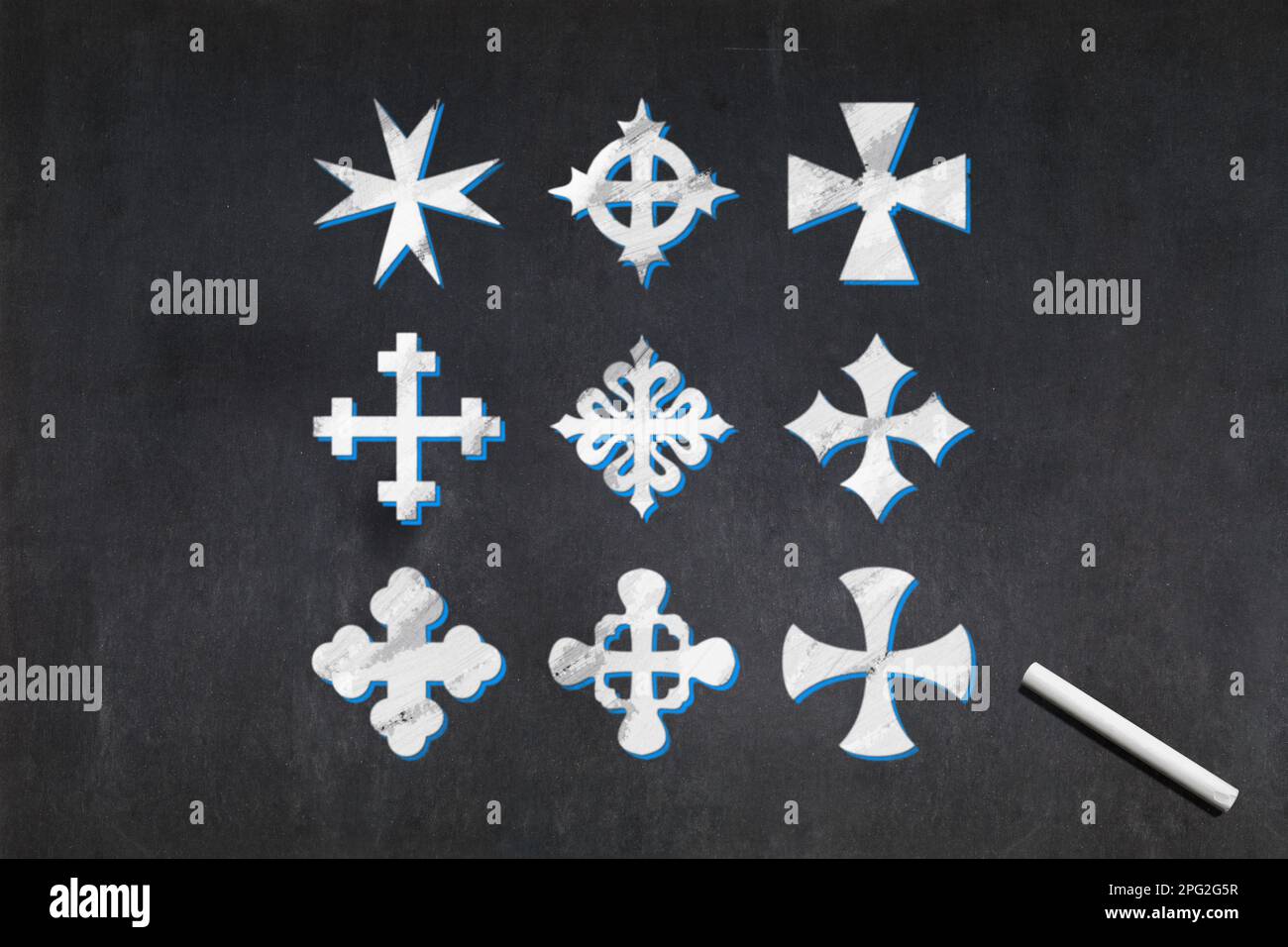 Blackboard with nine crosses of different shapes drawn in the middle ...