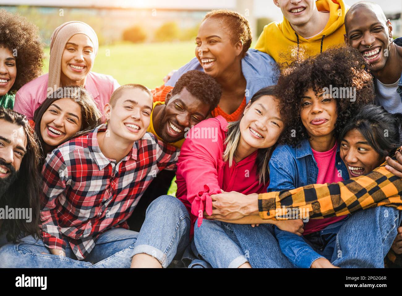 Young diverse people having fun outdoor laughing together - Focus on bald girl face Stock Photo ...