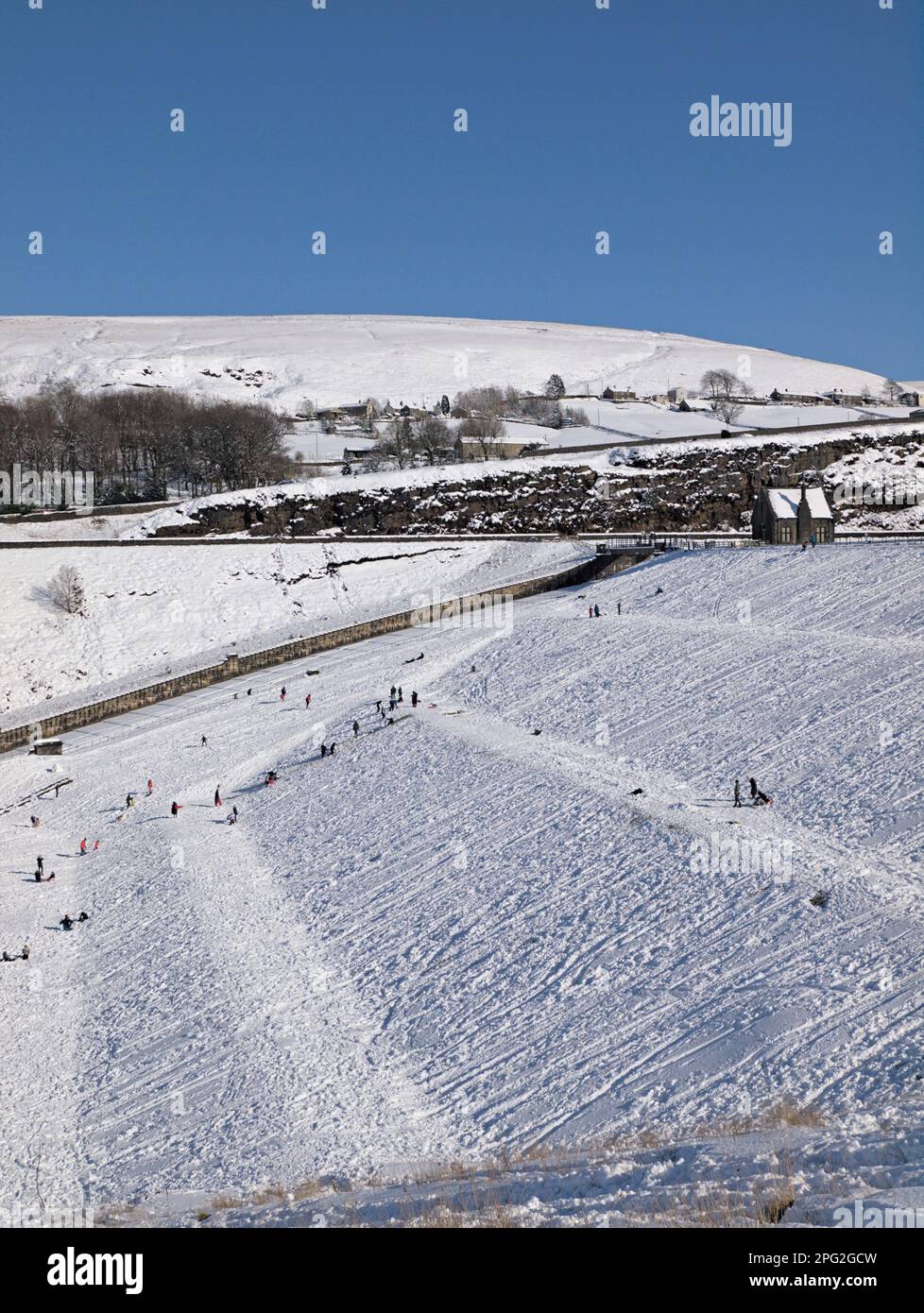 Sledging on Butterley Reservoir embankment in the Wessenden Valley ...