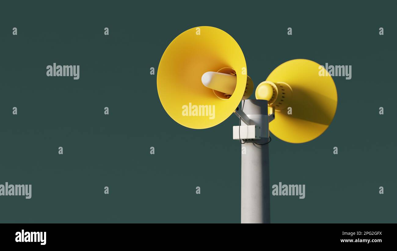 Yellow public address notification loudspeakers on a post against green ...