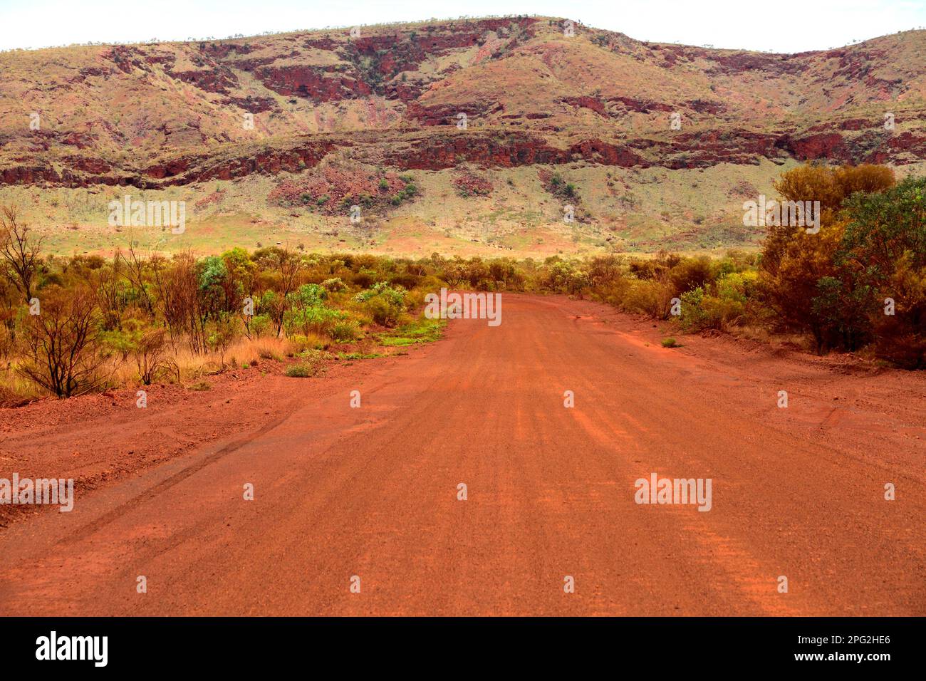 Red dirt road in outback landscape, Pilbara, Northwest Australia Stock ...