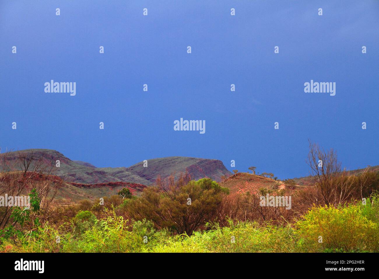 Dark stormy sky over outback landscape, Pilbara, Northwest Australia ...
