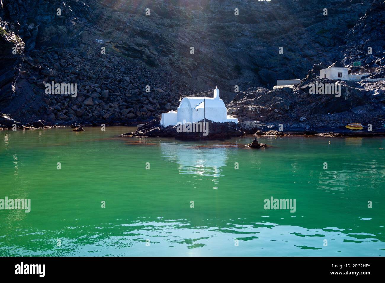 A small shite church at the hot springs on Palea Kameni Volcanic Island ...