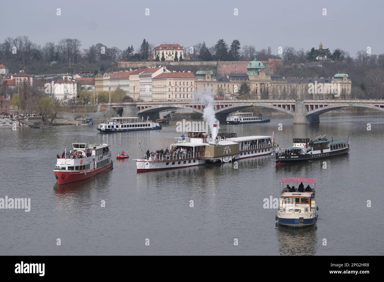 Historic steamboat (paddle steamers) Labe with tourists at Vltava River ...