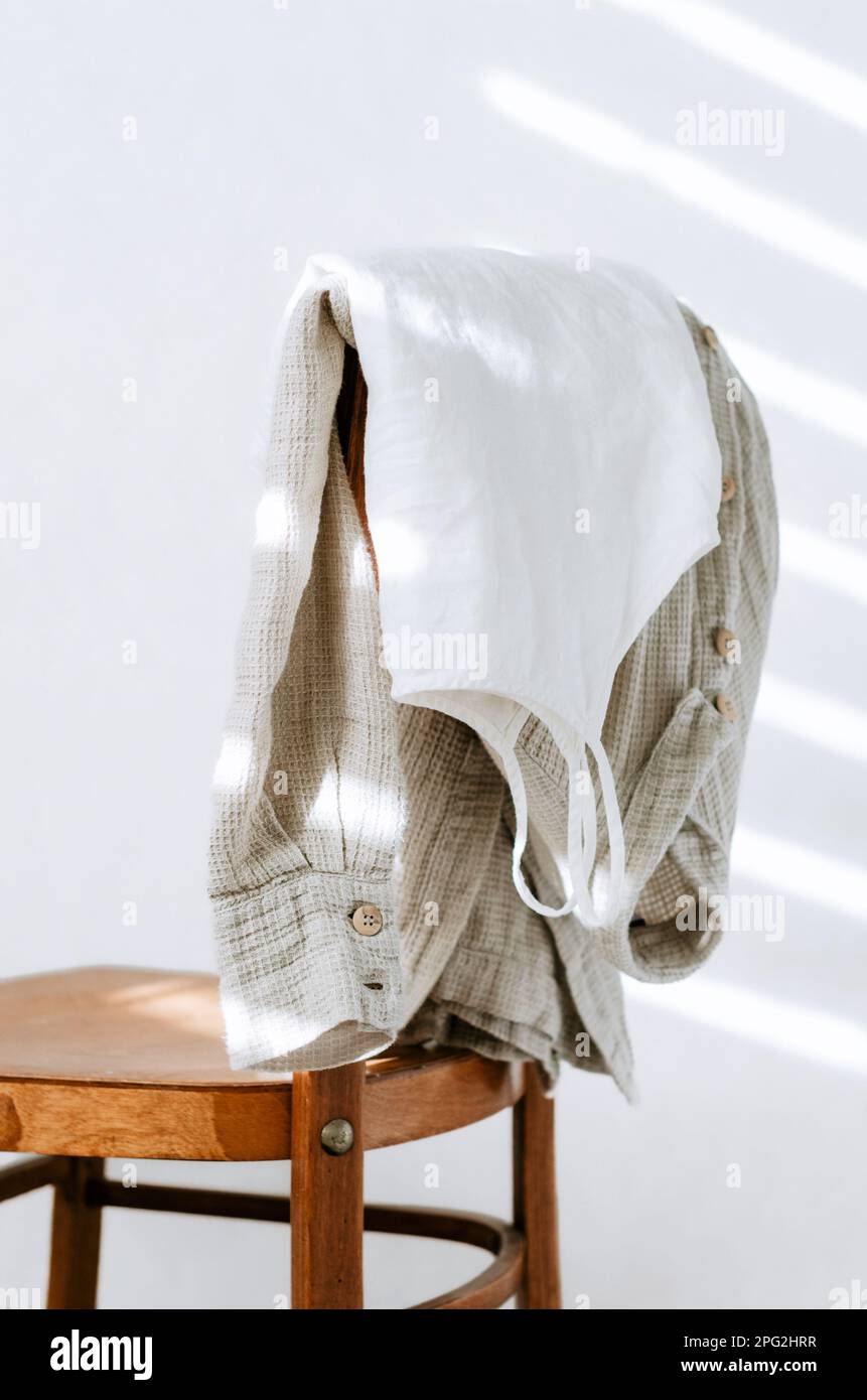 Close up white handmade linen top and natural waffle linen shirt on ...