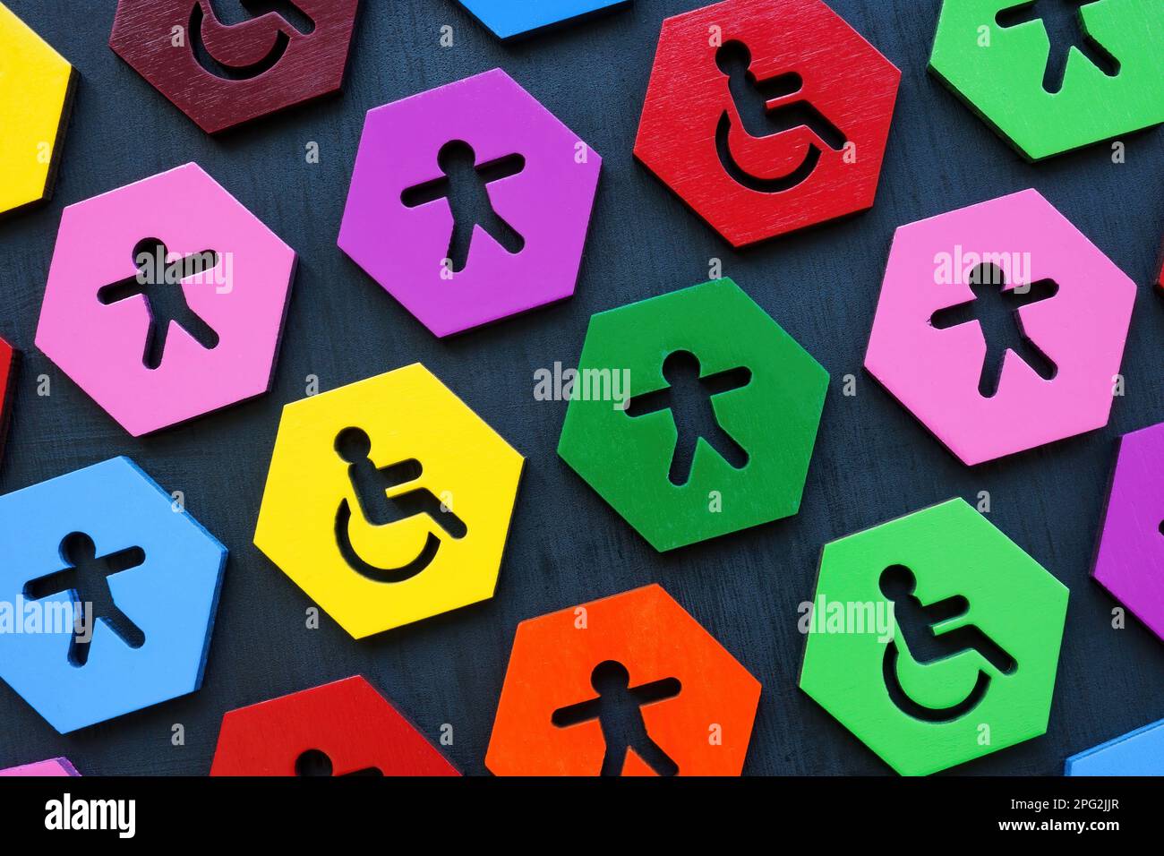 Inclusion and diversity. Colorful plates with figurines and disable ...