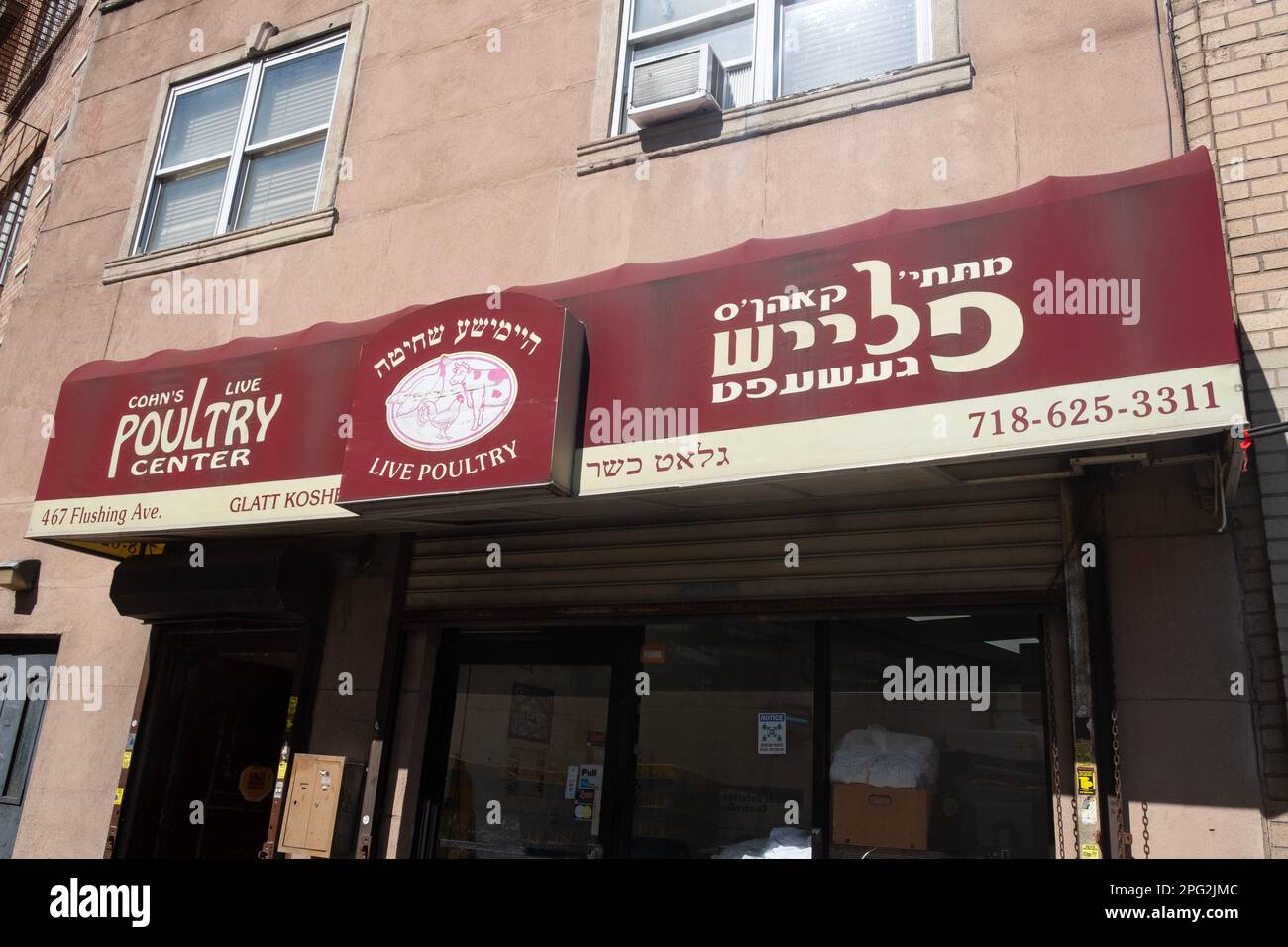 The canopy sign outside of Cohn's Live Poultry Center on Flushing ...