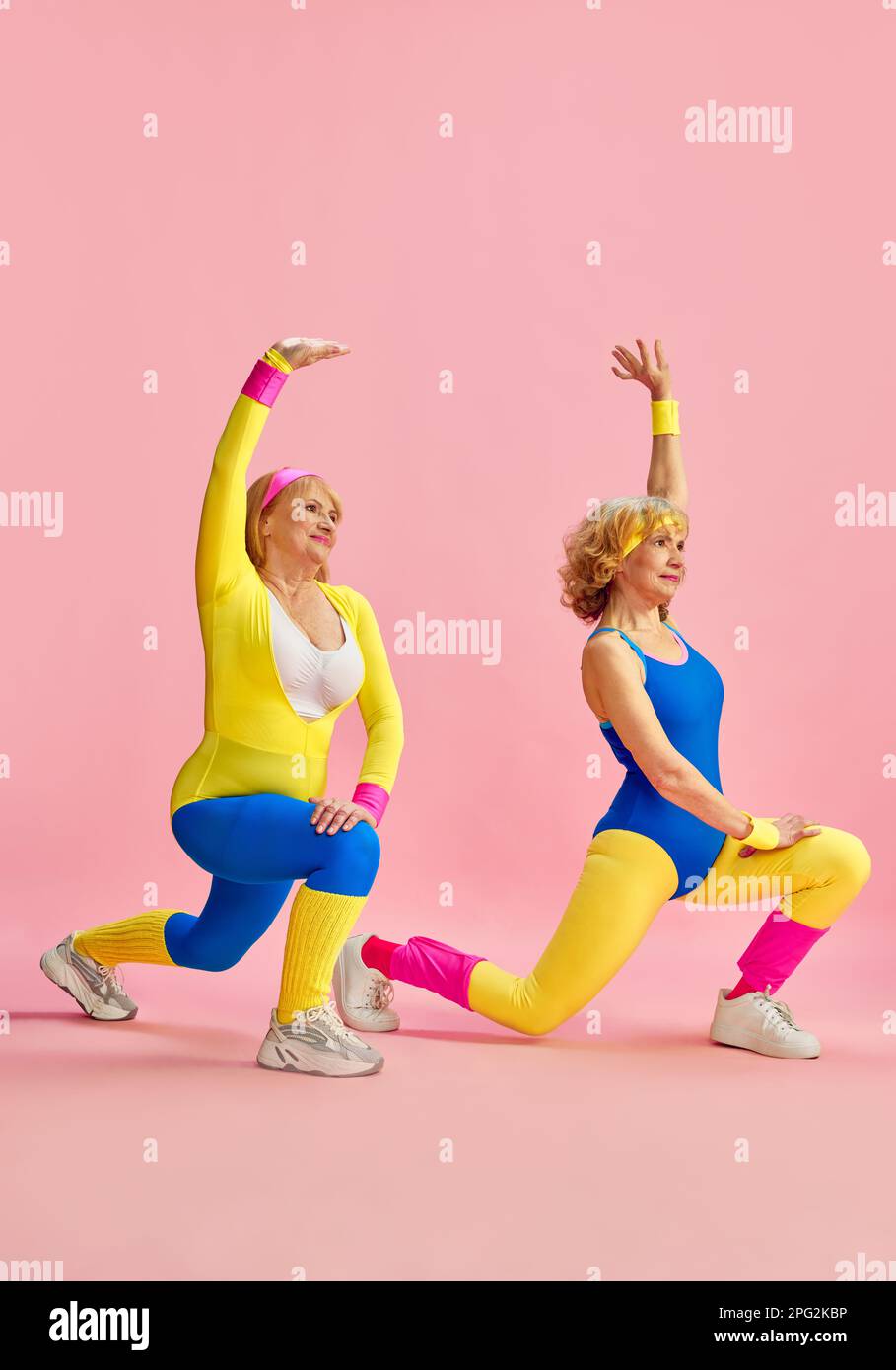 Sportive,beautiful, elderly woman in colorful sportswear training ...