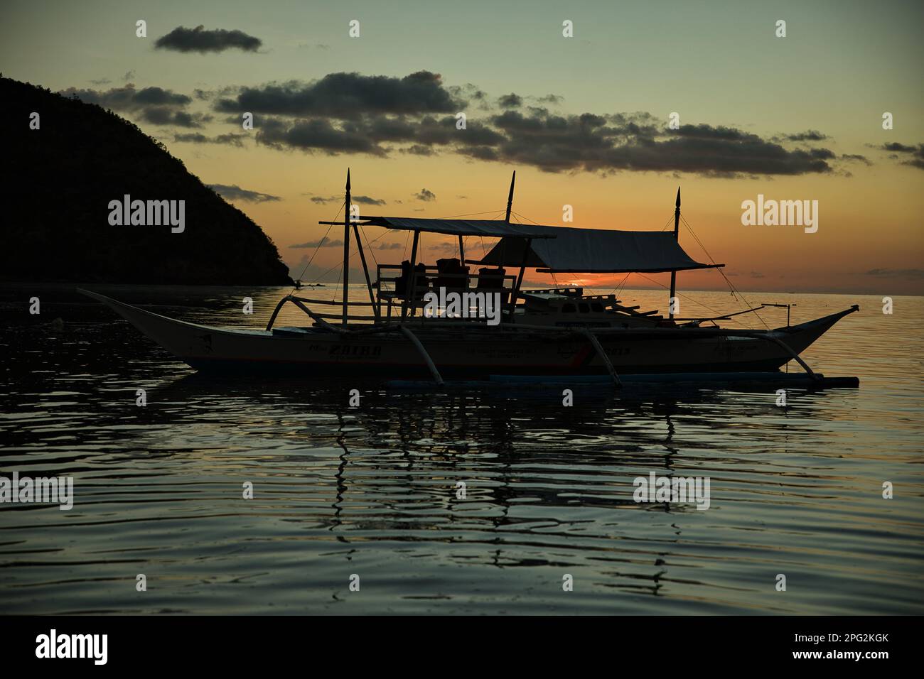 Picturesque golden yellow red sunset on the sea of Coron in the ...
