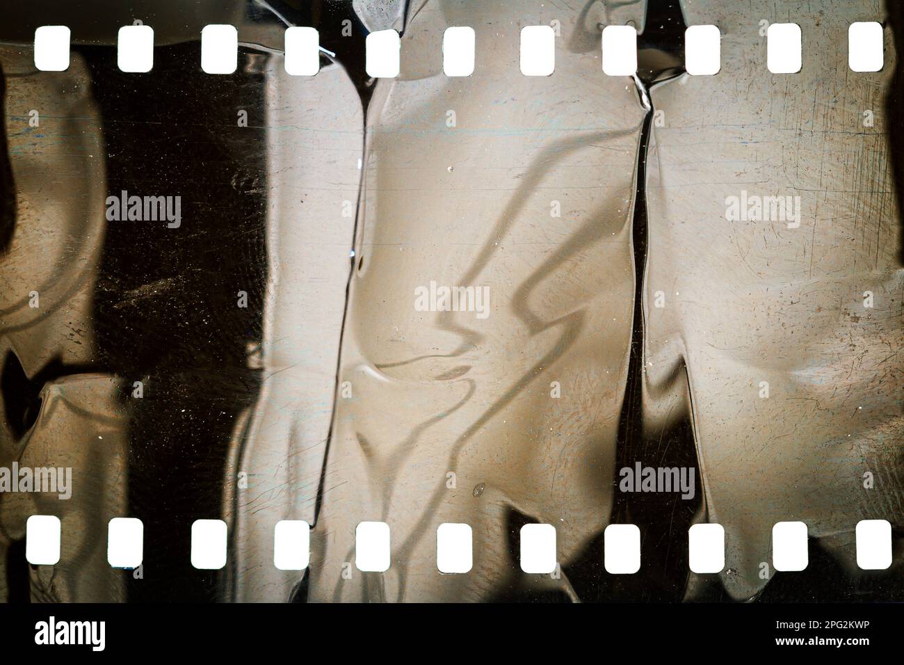 Dusty and grungy 35mm film texture or surface. Perforated scratched ...