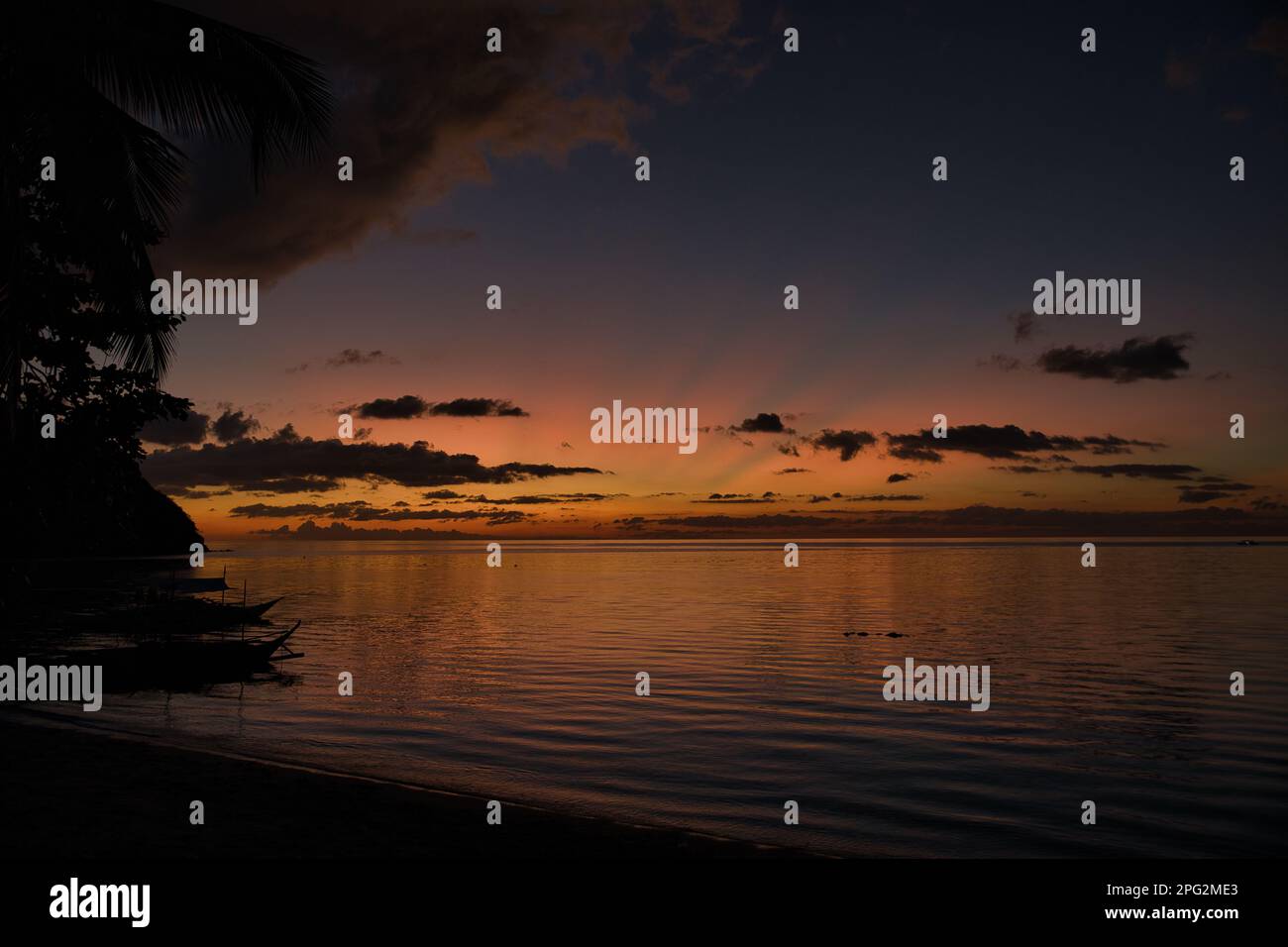 Picturesque sunset on the beach of Coron in the Philippines, the whole ...
