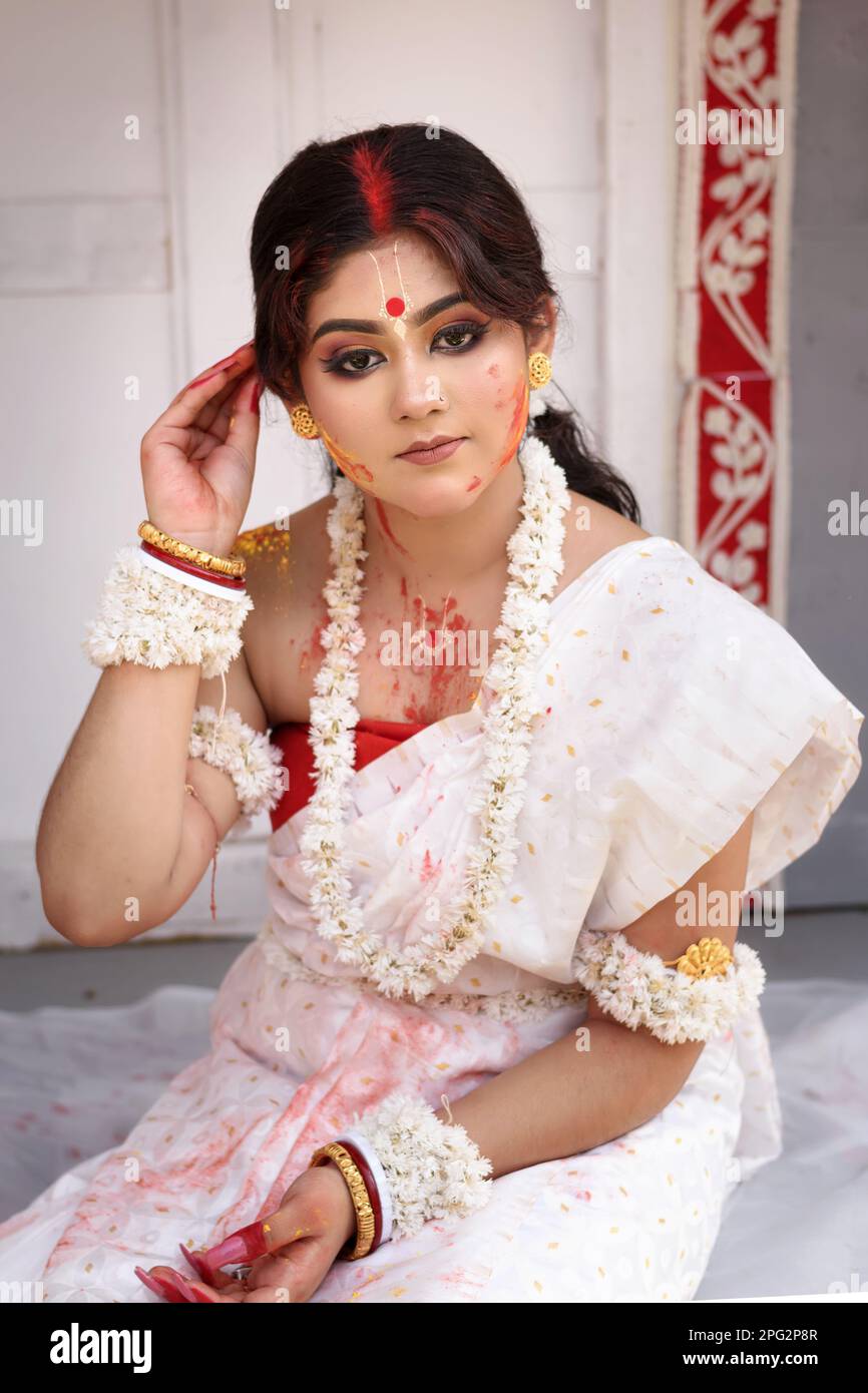 Portrait Of A Pretty Young Indian Woman Wearing Traditional Saree And