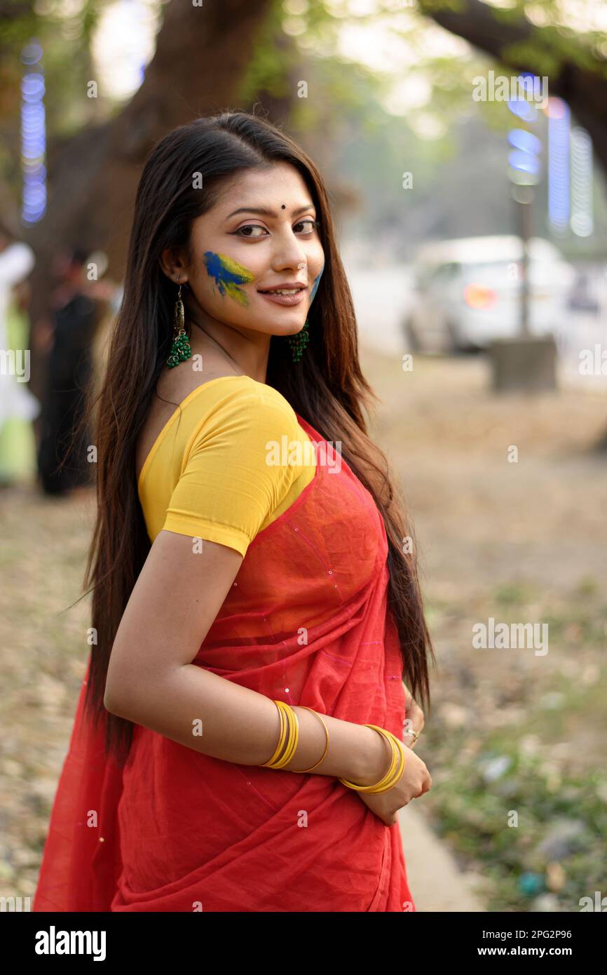 Portrait Of A Pretty Young Indian Woman Wearing Traditional Saree And