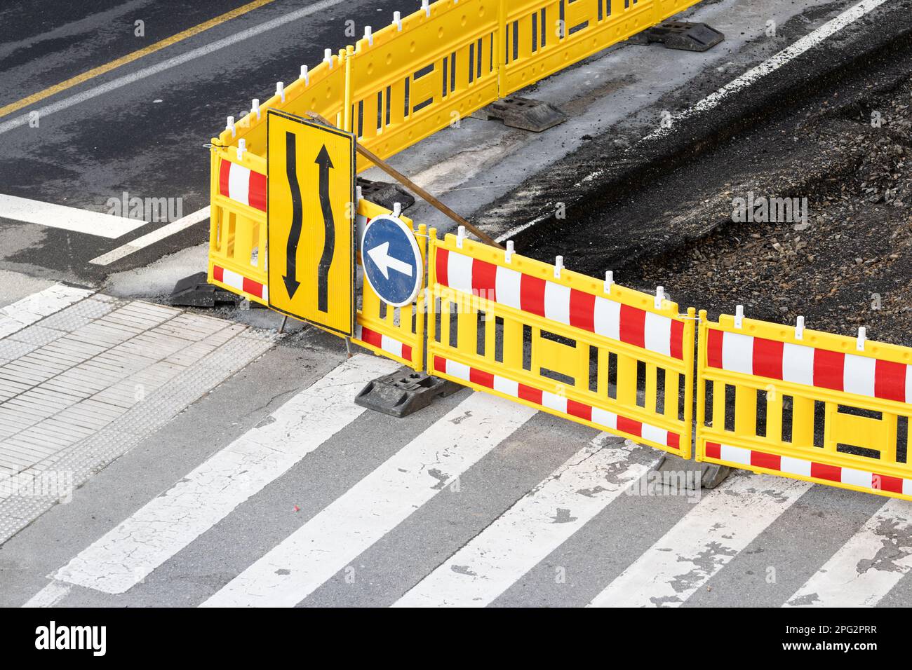 Road under construction background. Construction fences and signs on a ...