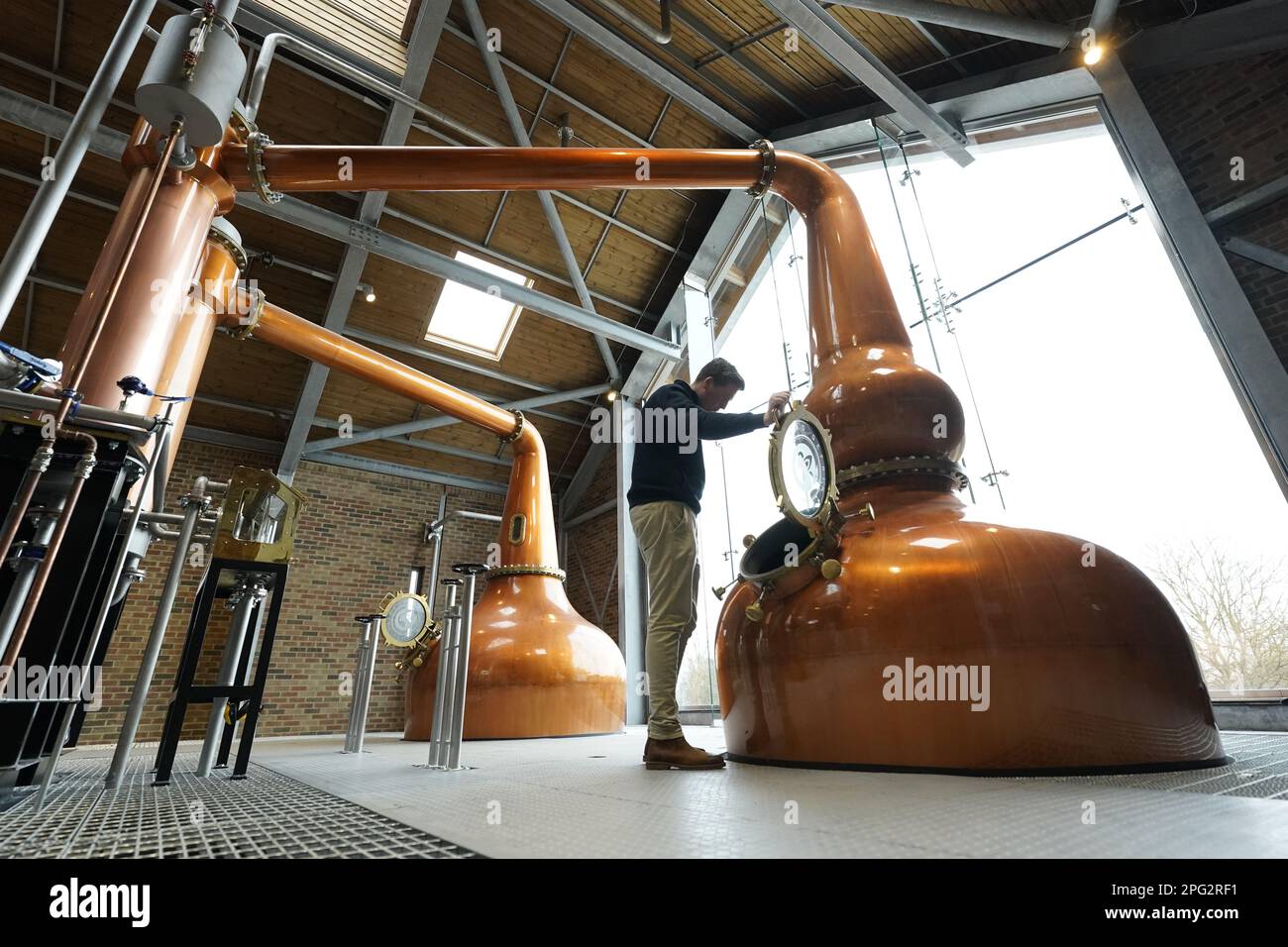Ben Murphy, 37, director of distilling, checks the apparatus at the new ...