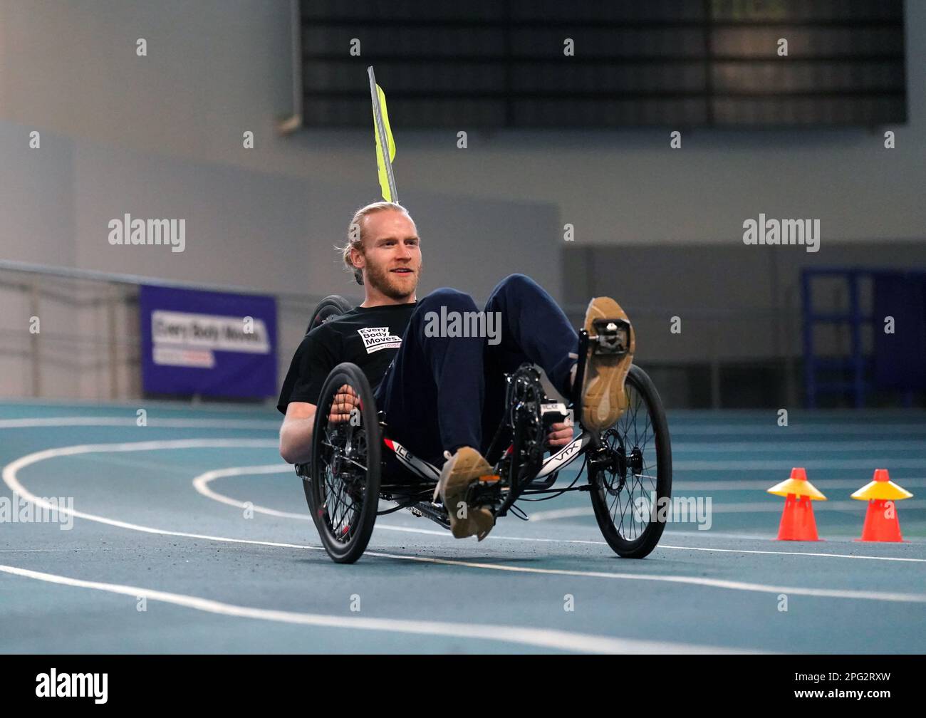 Paralympic gold medallist Jonnie Peacock riding a recumbent bike in an ...