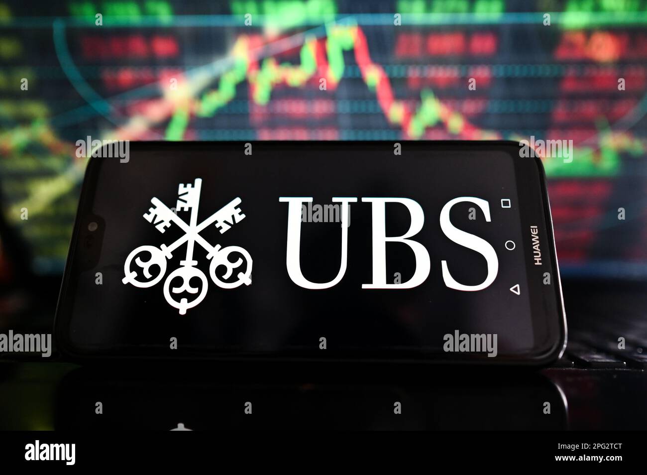 In this photo illustration, a UBS logo is displayed on a smartphone ...