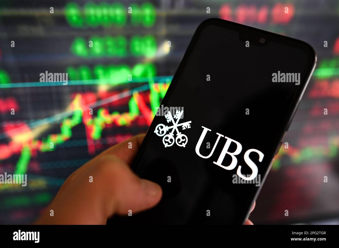 In this photo illustration, a UBS logo is displayed on a smartphone ...