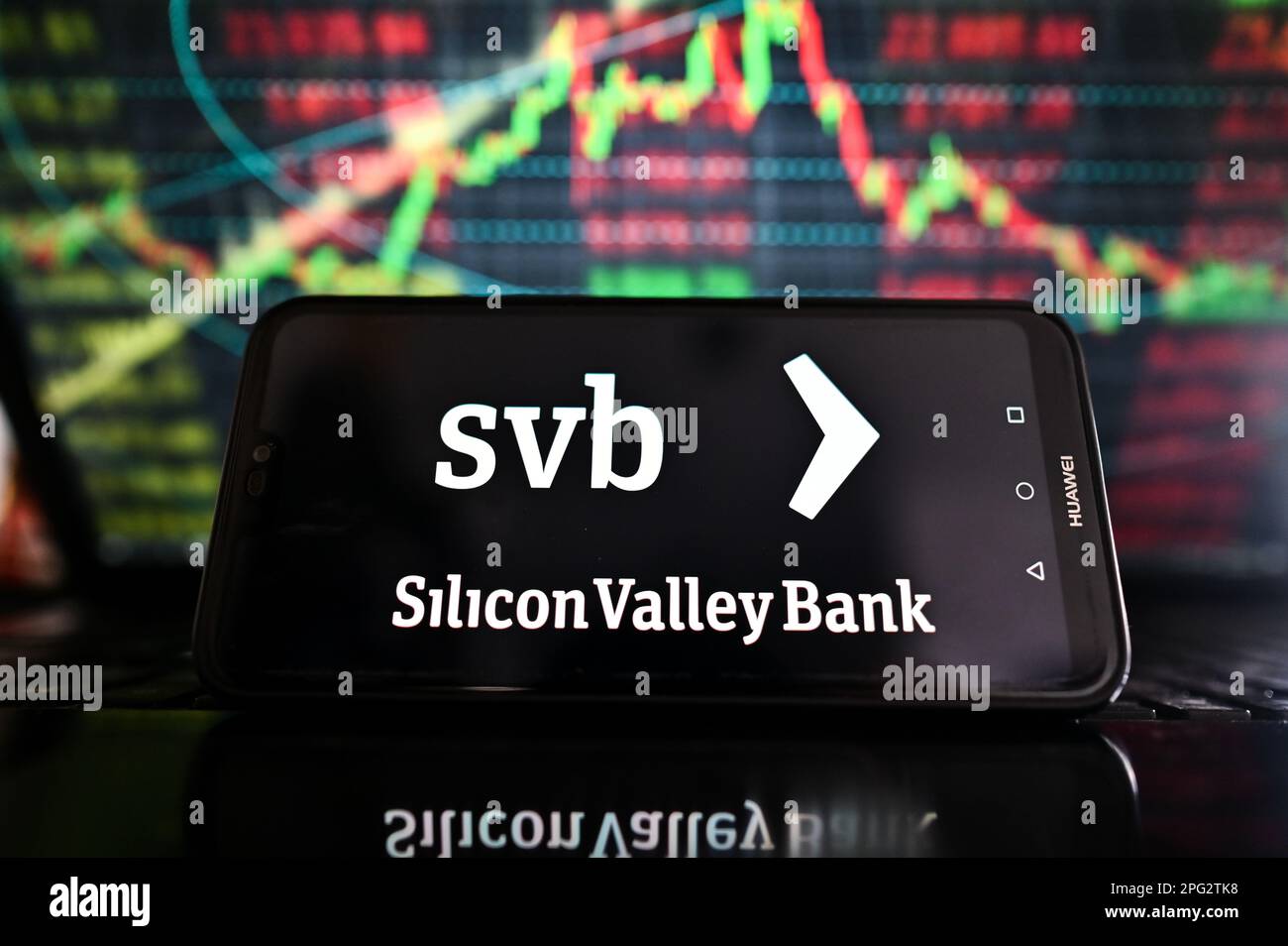 In this photo illustration, a Silicon Valley Bank logo is displayed on a smartphone with stock ...