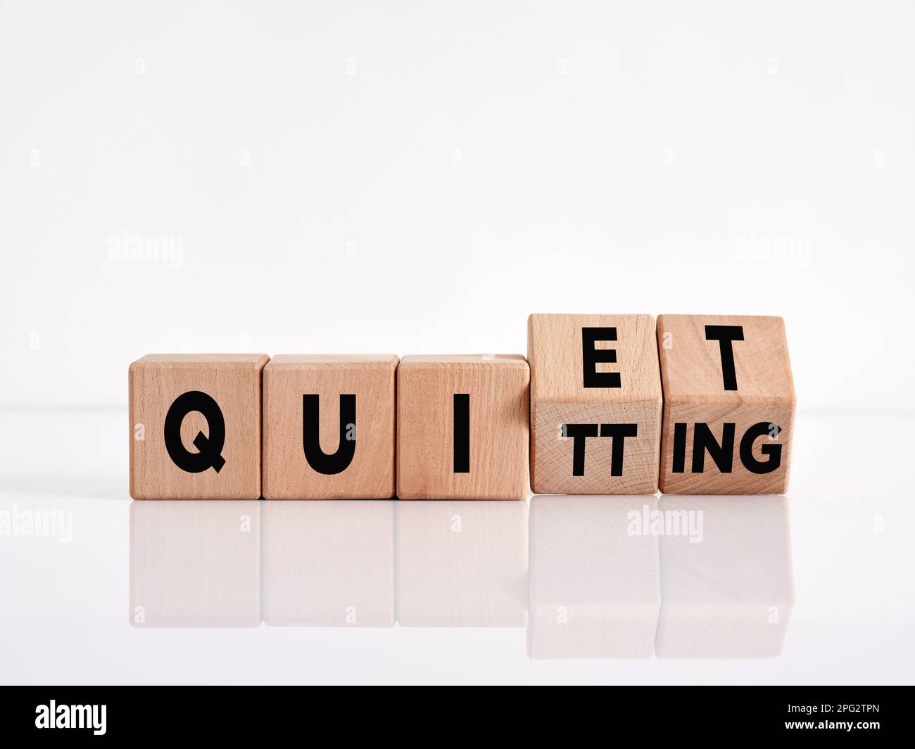 The word quiet quitting on wooden cubes. Business employment concept ...