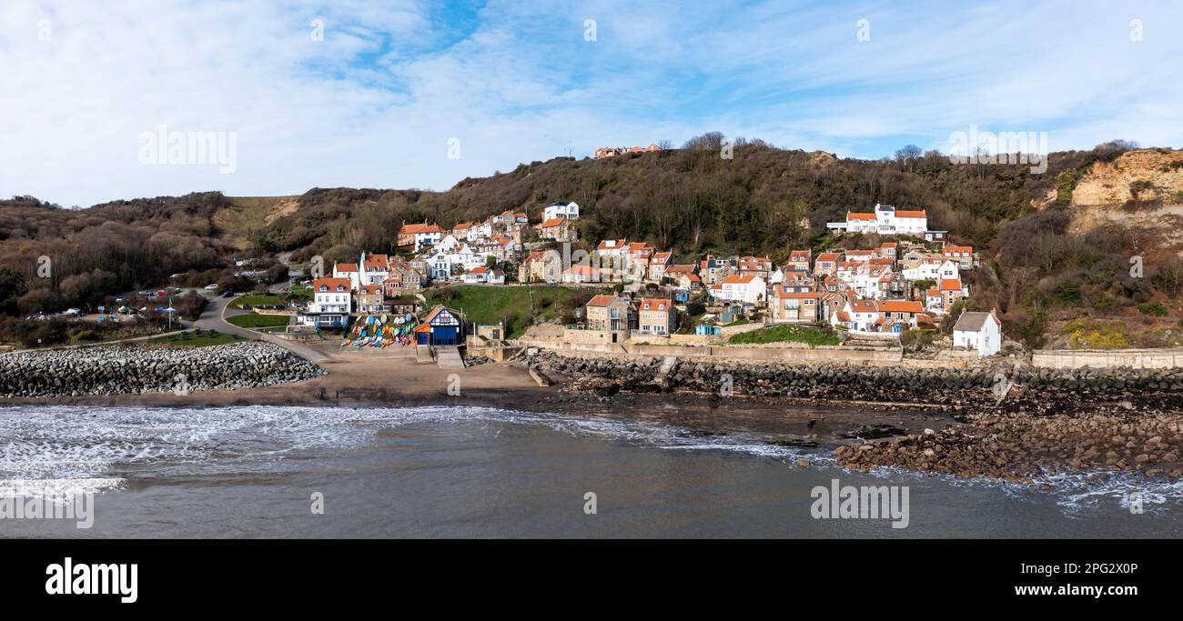 An aerial view from the sea of the pretty coastal fishing village of ...