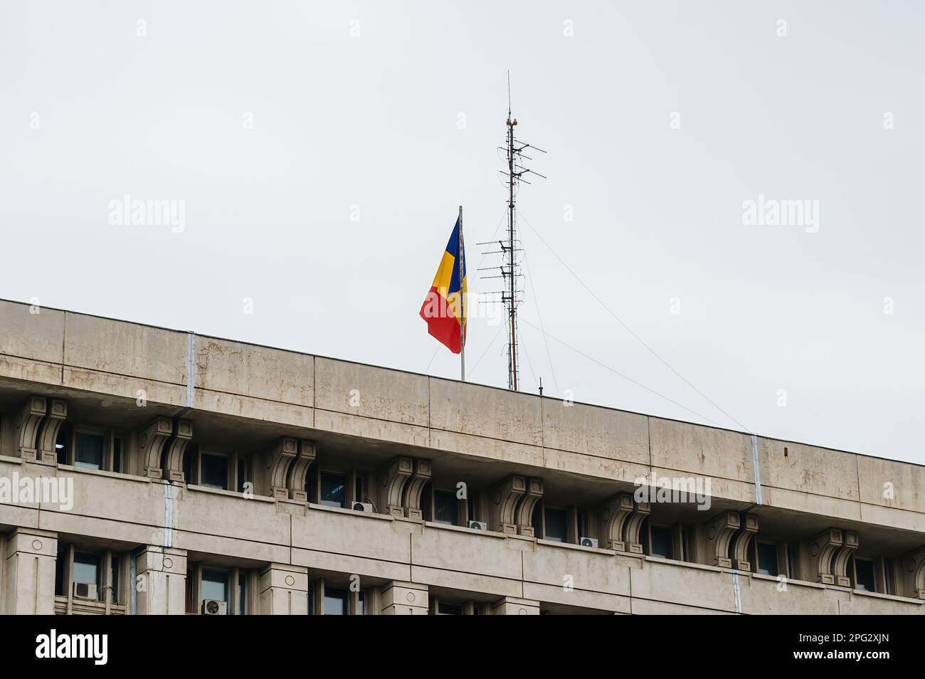 The vibrant Romanian tricolore flag flutters in the breeze: red, yellow ...