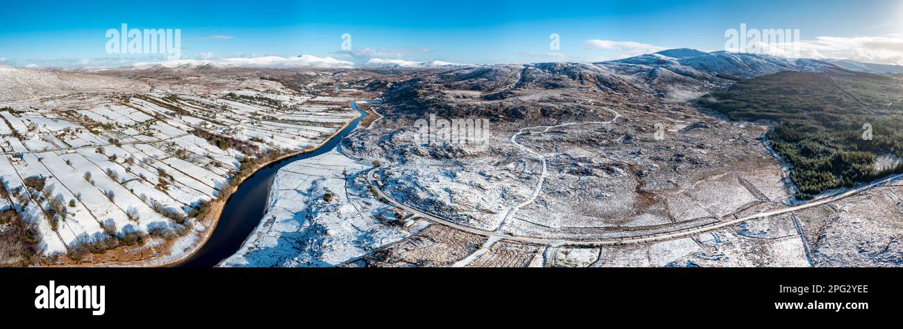 Aerial view of snow covered Gweebarra River between Doochary and ...