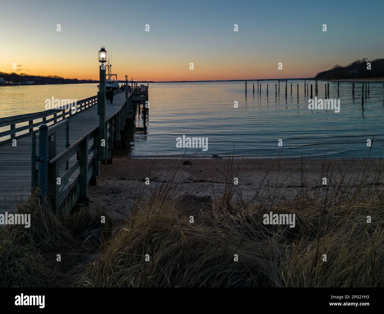 An aerial view of the Port Jefferson Harbor during a beautiful and ...