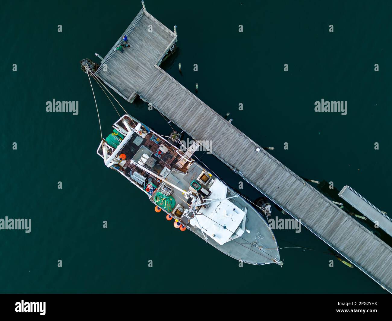 An aerial view of the Port Jefferson Harbor in the evening in the US ...