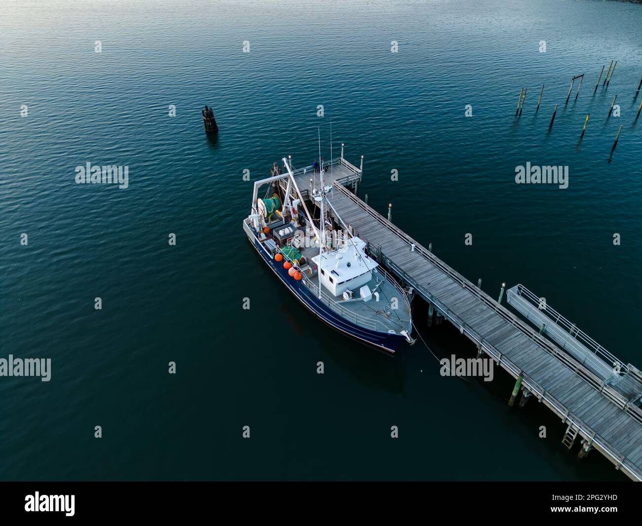 An aerial view of the Port Jefferson Harbor in the evening in the US ...