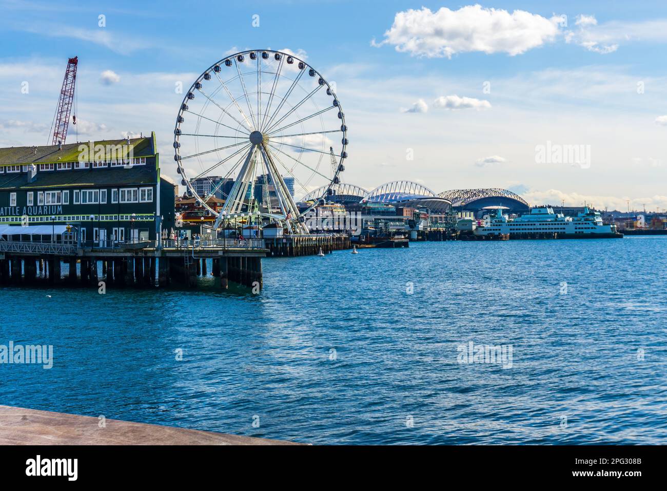 A view of the Great Ferris Wheel on a pier in Seattle, Washington Stock ...