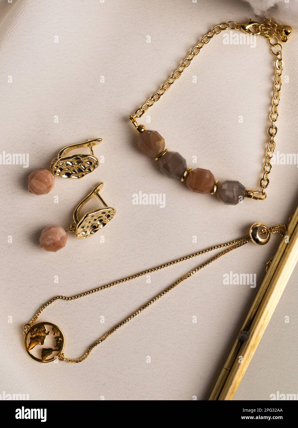 Necklace and earrings made of natural stones. Natural mineral texture ...