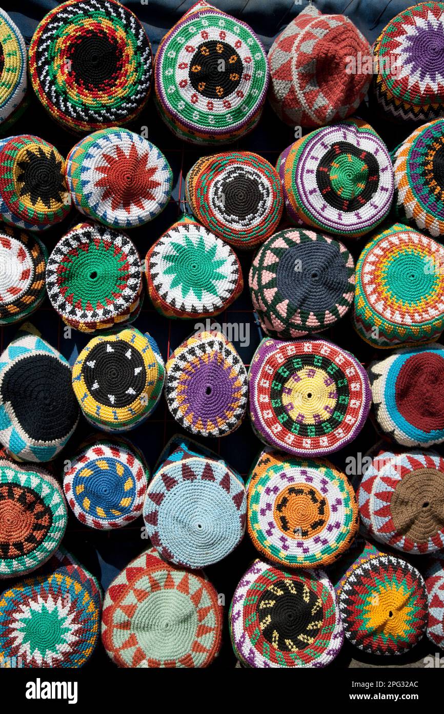 Egypt, Sharm El-Sheikh, Naama Bay, various colourful embroidered hats ...