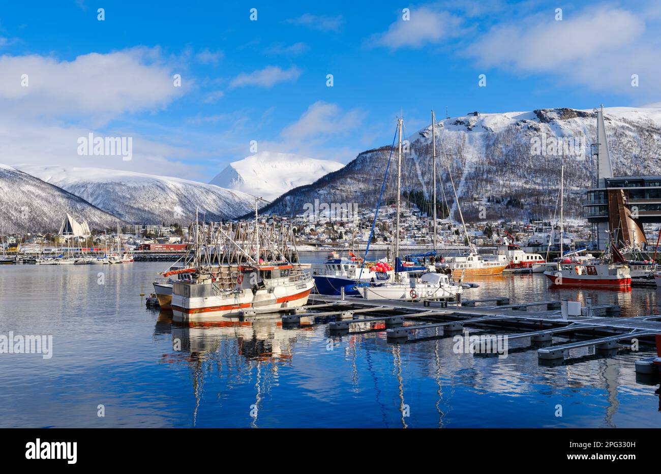 The harbour. Tromso or Tromsoe during winter in the northern part of ...