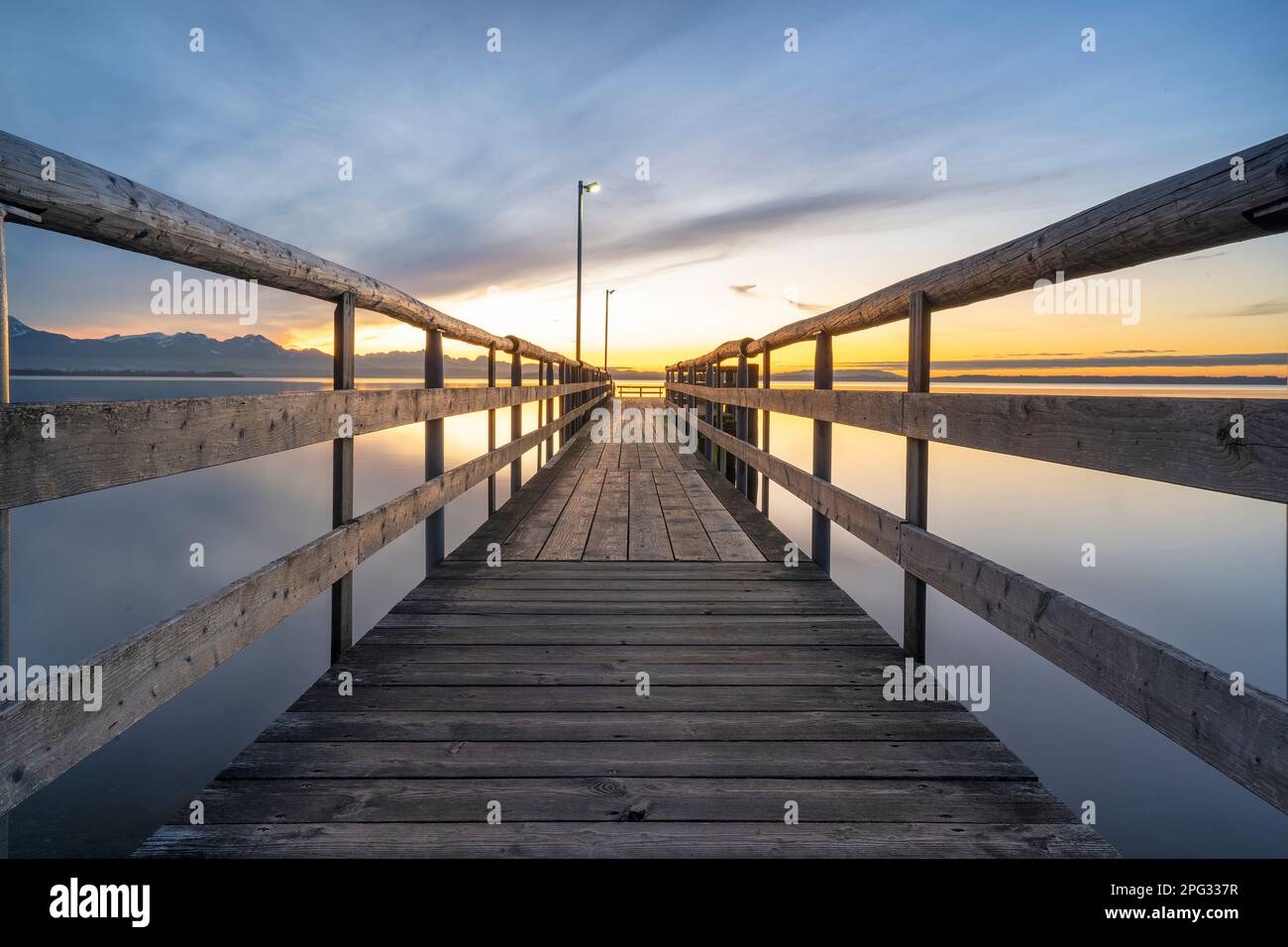 Sunset over Lake Chiemsee near Chieming, Chiemgau, Germany Stock Photo ...