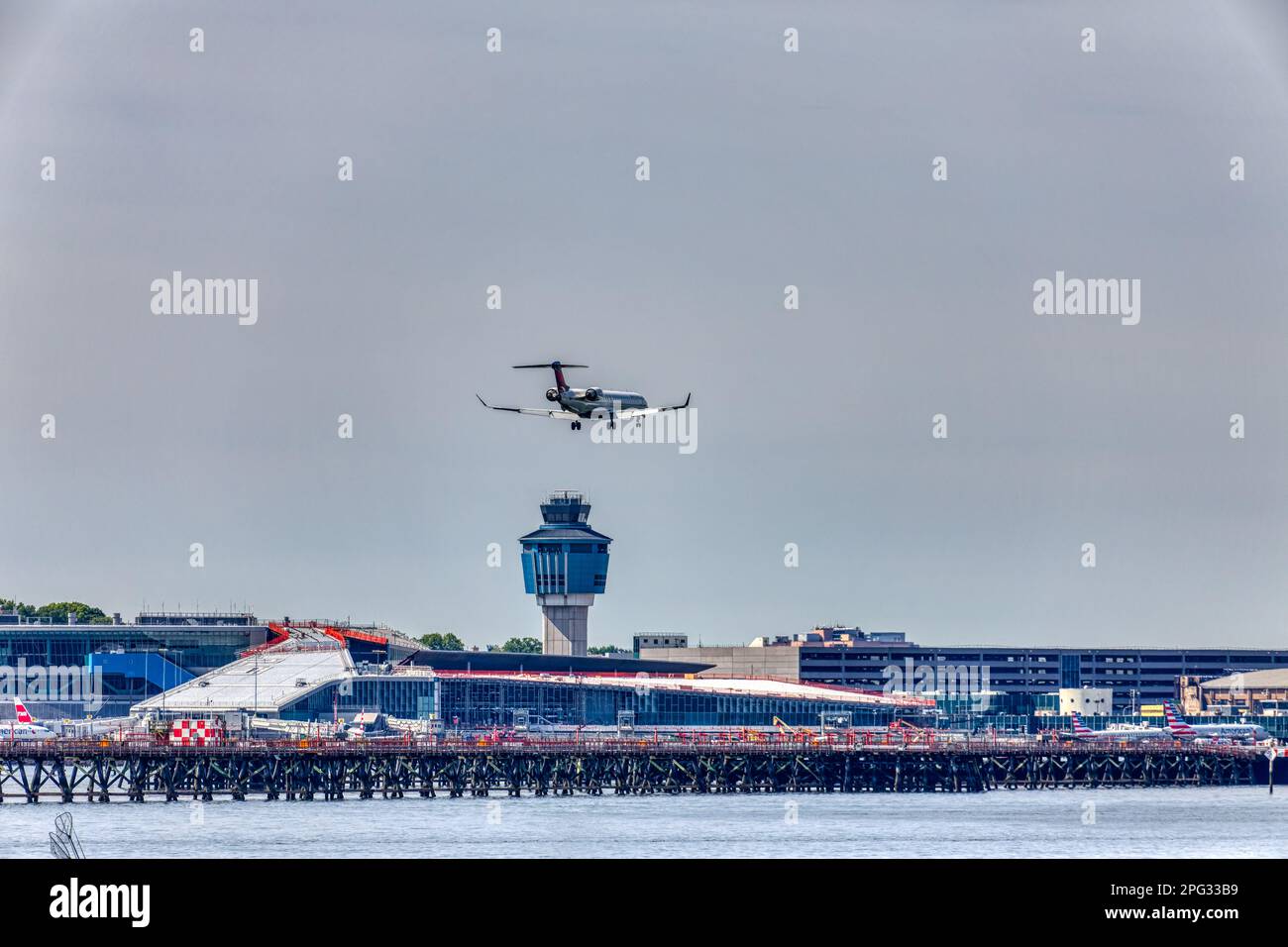 A Delta Connection Bombardier CRJ-900 twin-engine passenger jet ...