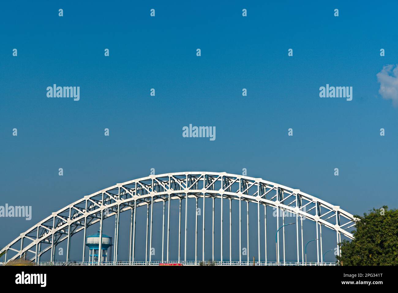 arch shaped road bridge over the river canal Stock Photo - Alamy