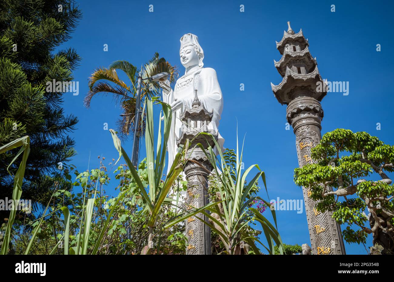 An enormous white statue at the newly built buddhist Chua Van Duc, or Van Duc Pagoda near Dalat ...